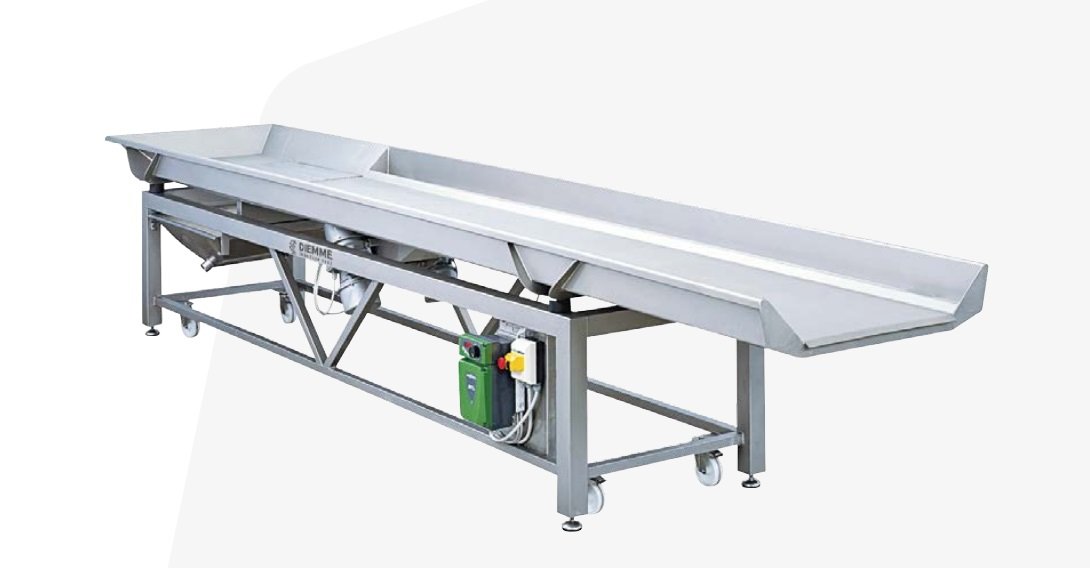 Vibrating table for transport and selection of grapes - Destiller